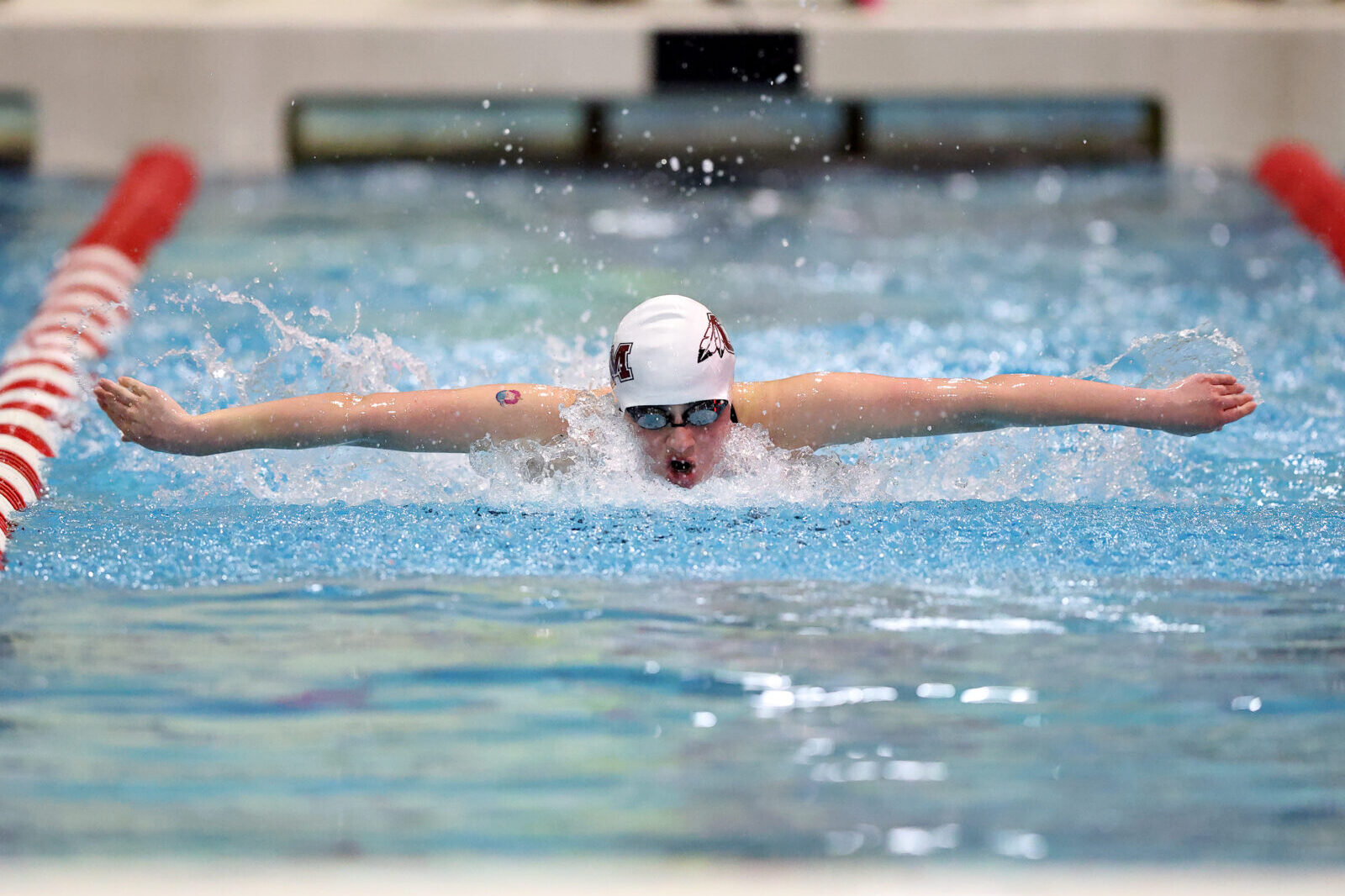 Photo galleries from all 3 girls swimming state meets