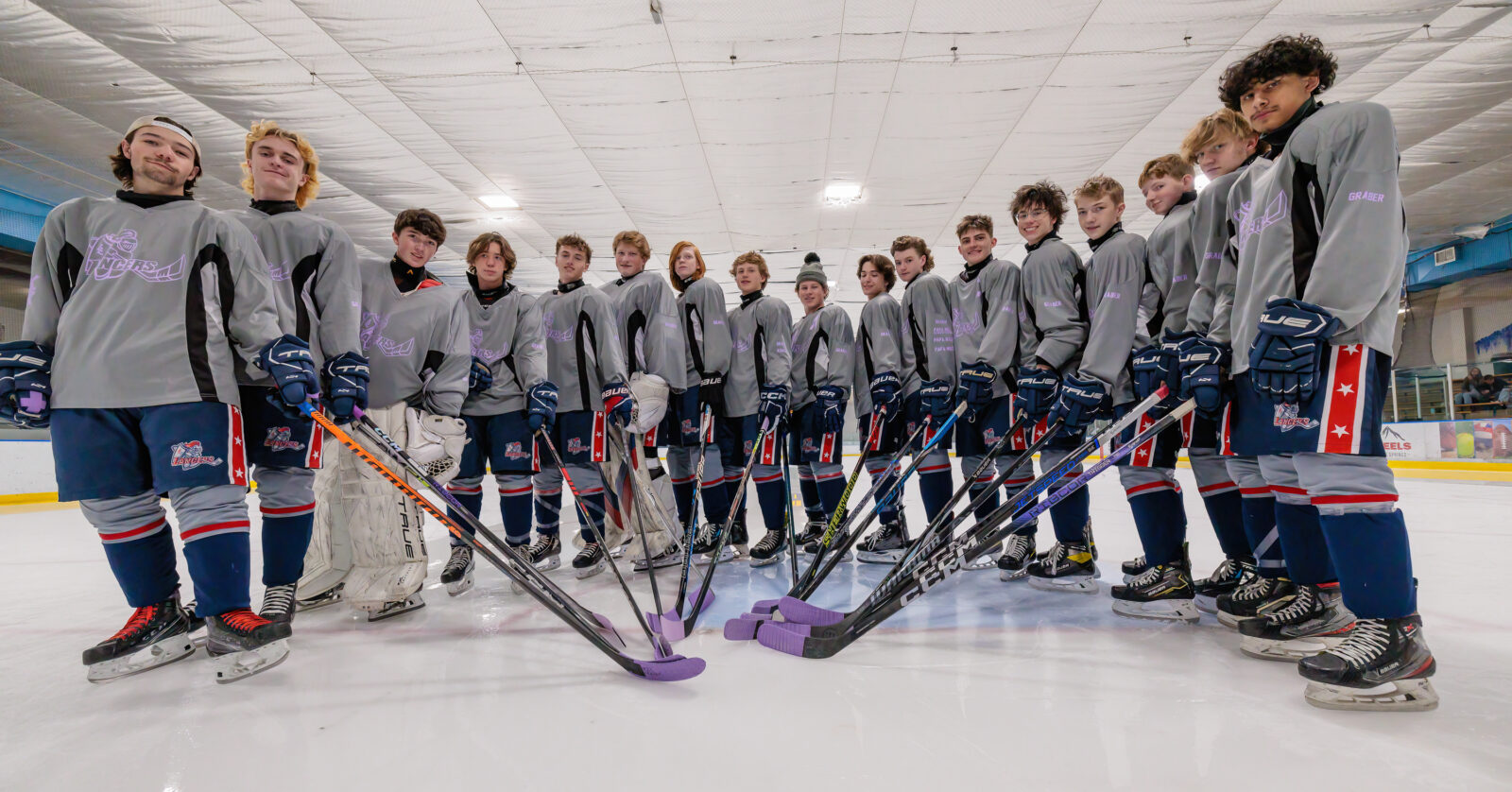 Liberty hockey and former captain finding inspiration in each other
