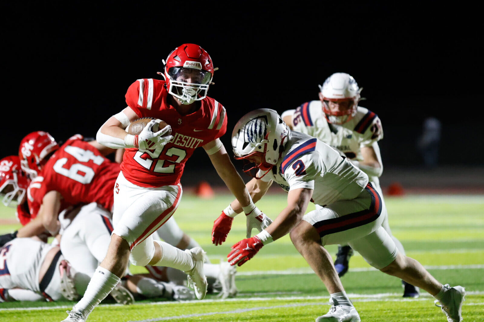 Regis Jesuit football rolls by Chaparral for third straight win