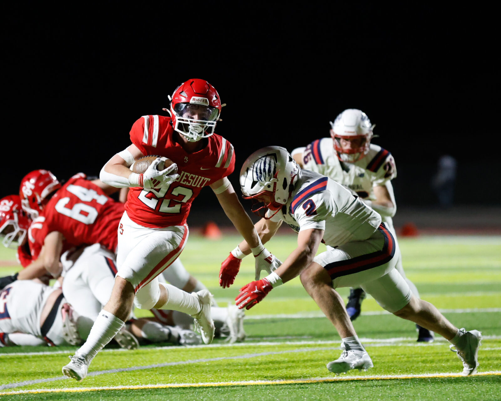 Regis Jesuit football rolls by Chaparral for third straight win