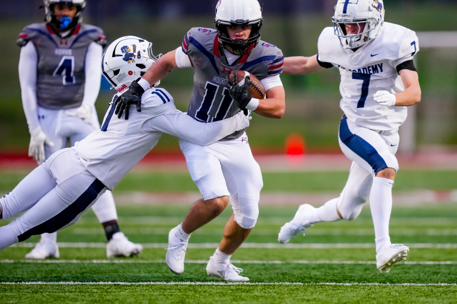 Mangrum again leads Sand Creek football in win over Air Academy