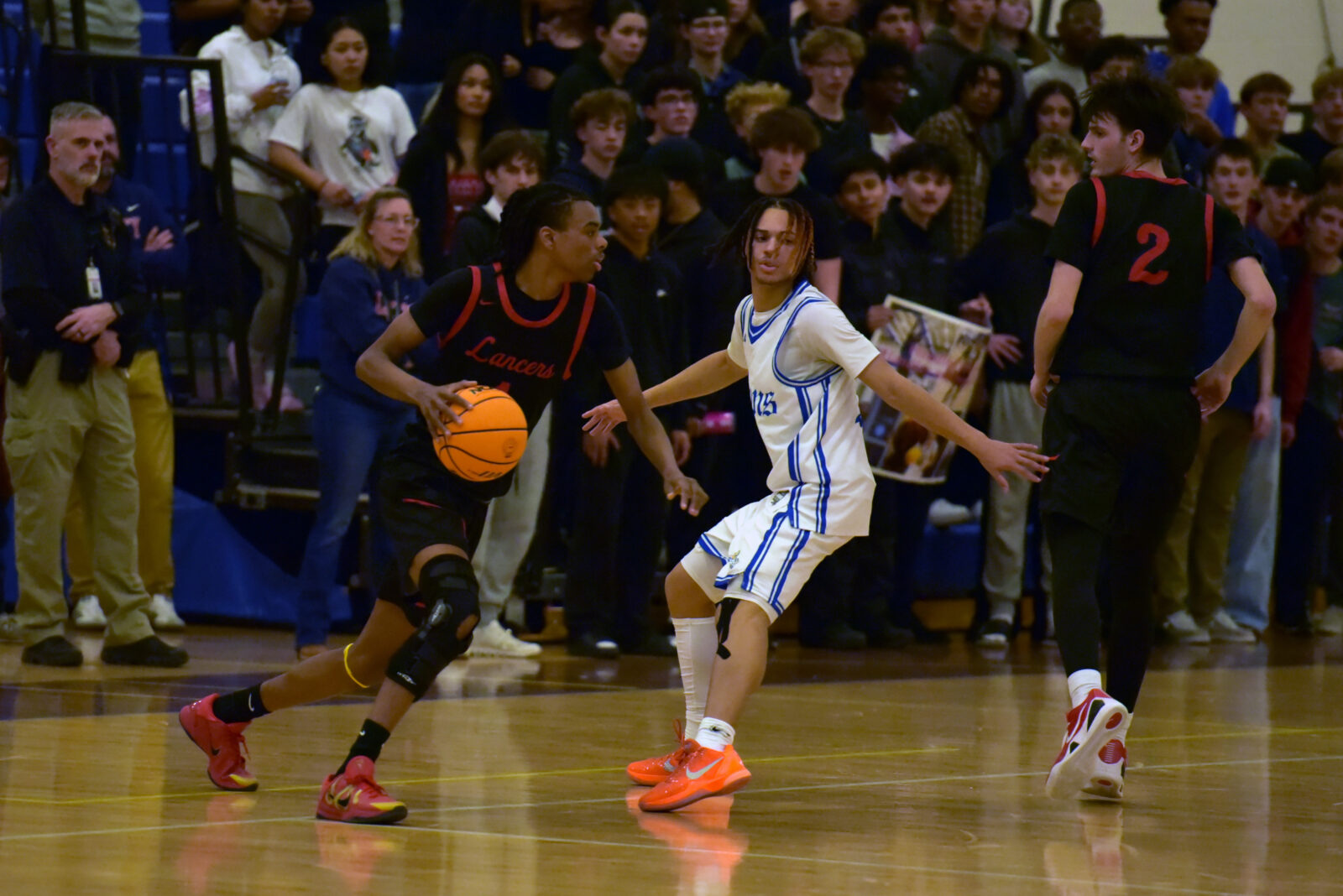 Liberty boys basketball pulls away from district rival Rampart