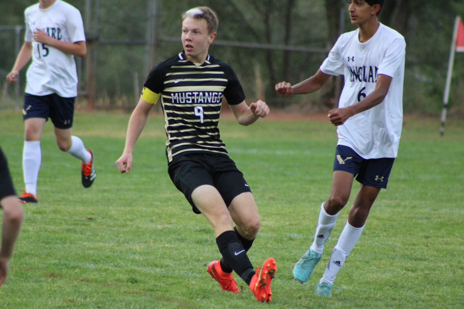 Alexander Steger providing a kick to two Manitou Springs teams