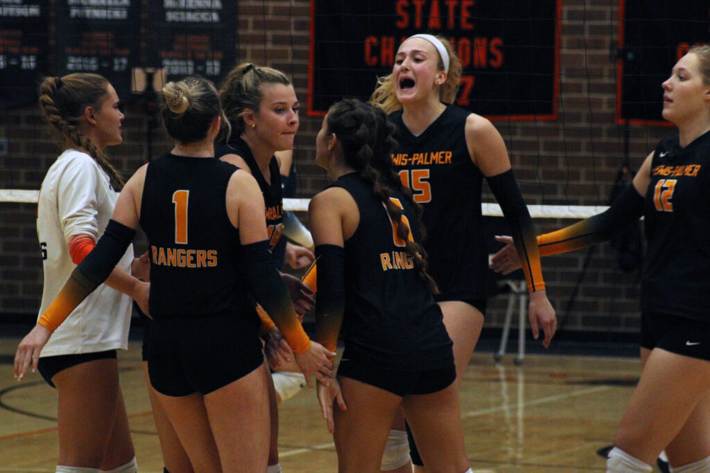 Lewis-Palmer volleyball coach Alexa Strube chats a big rivalry win