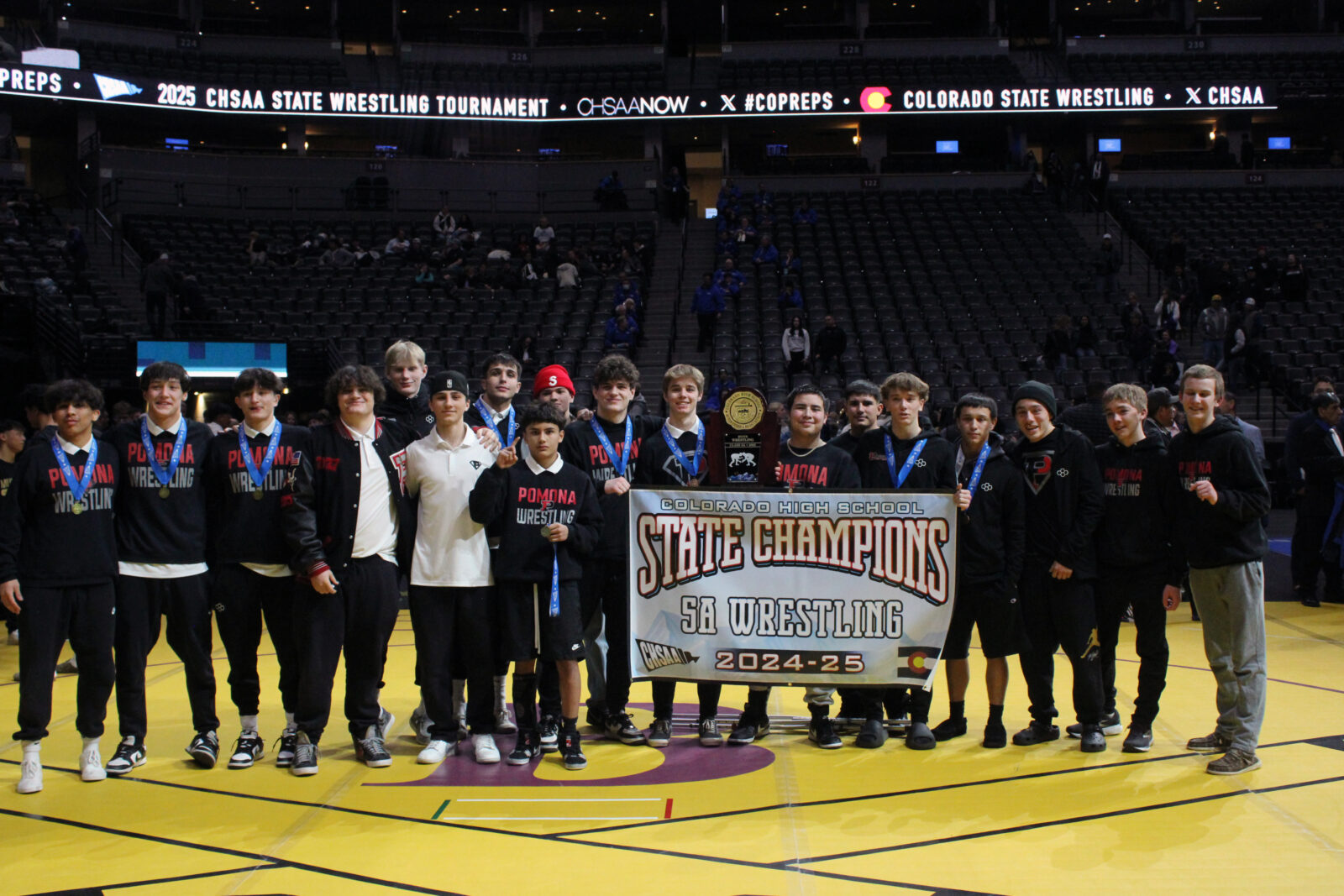 Pomona boys wrestling in 7th Heaven after winning 5A title